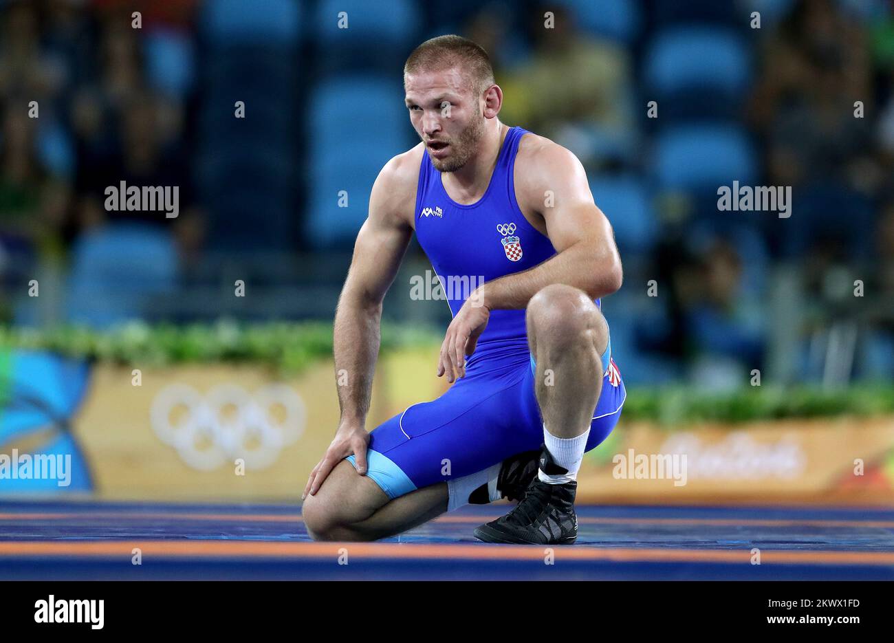Bozo Starcevic of Croatia competes against Kim Hyeon-Woo of Korea ...