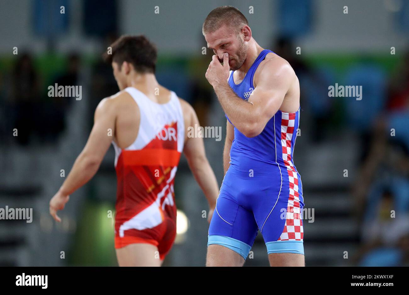 Bozo Starcevic of Croatia competes against Kim Hyeon-Woo of Korea ...