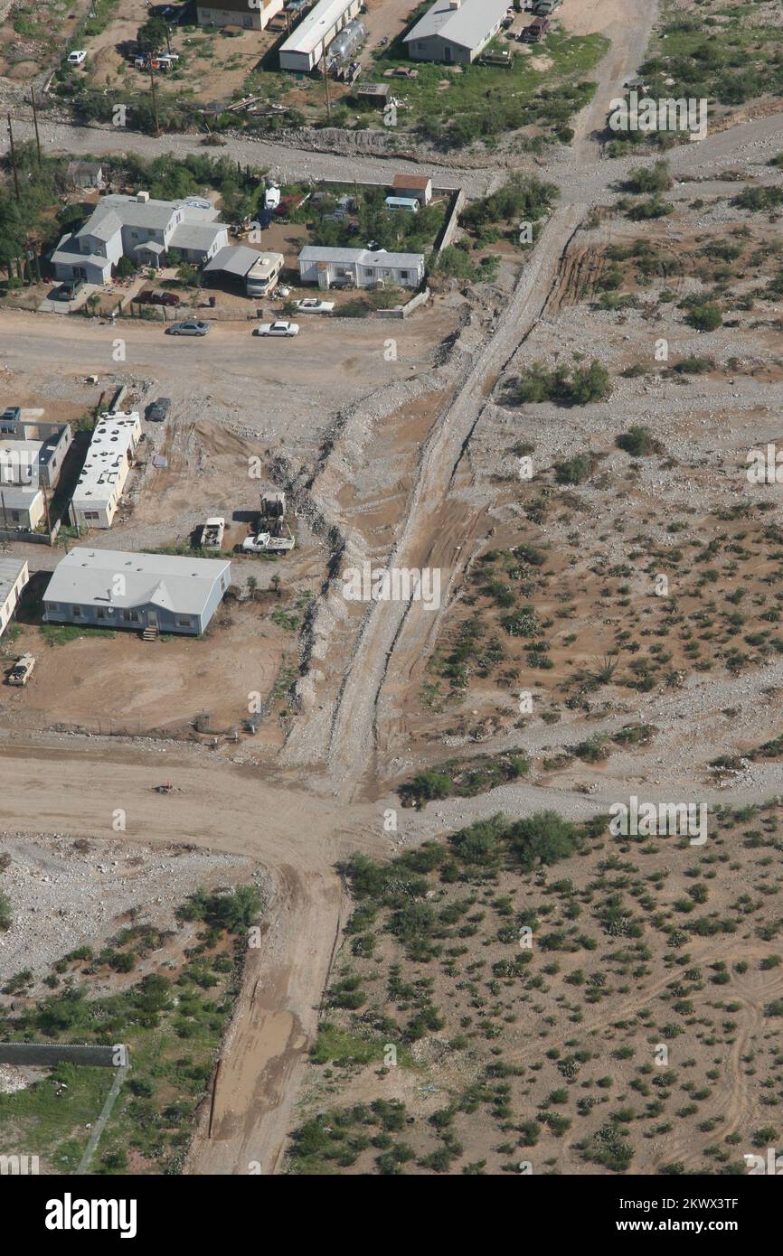El Paso, TX - Municipalities construct temporary berms between heavy ...