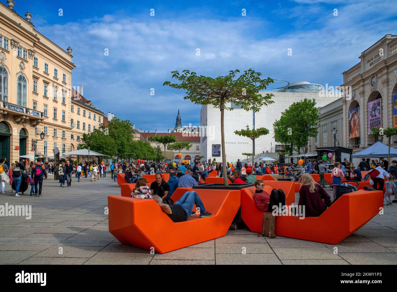 Museums Quartier square with people and modern art museum MUMOK in ...