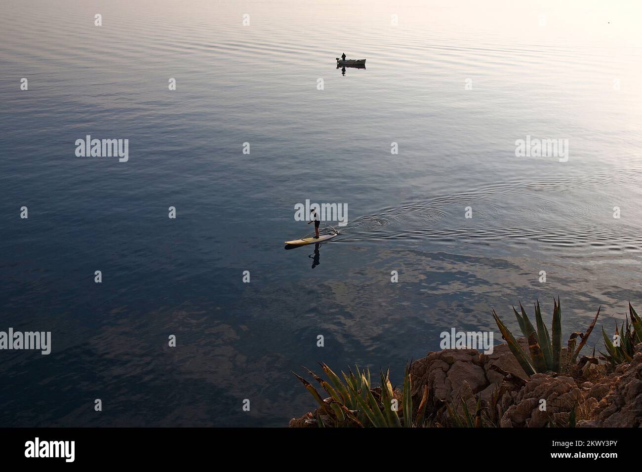 17.02.2017., Makarska, Croatia - Calm sea before weather change. Man ...