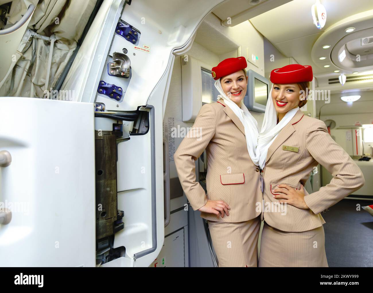 DUBAI - OCT 17: Emirates crew members meet passengers in Airbus A380 ...