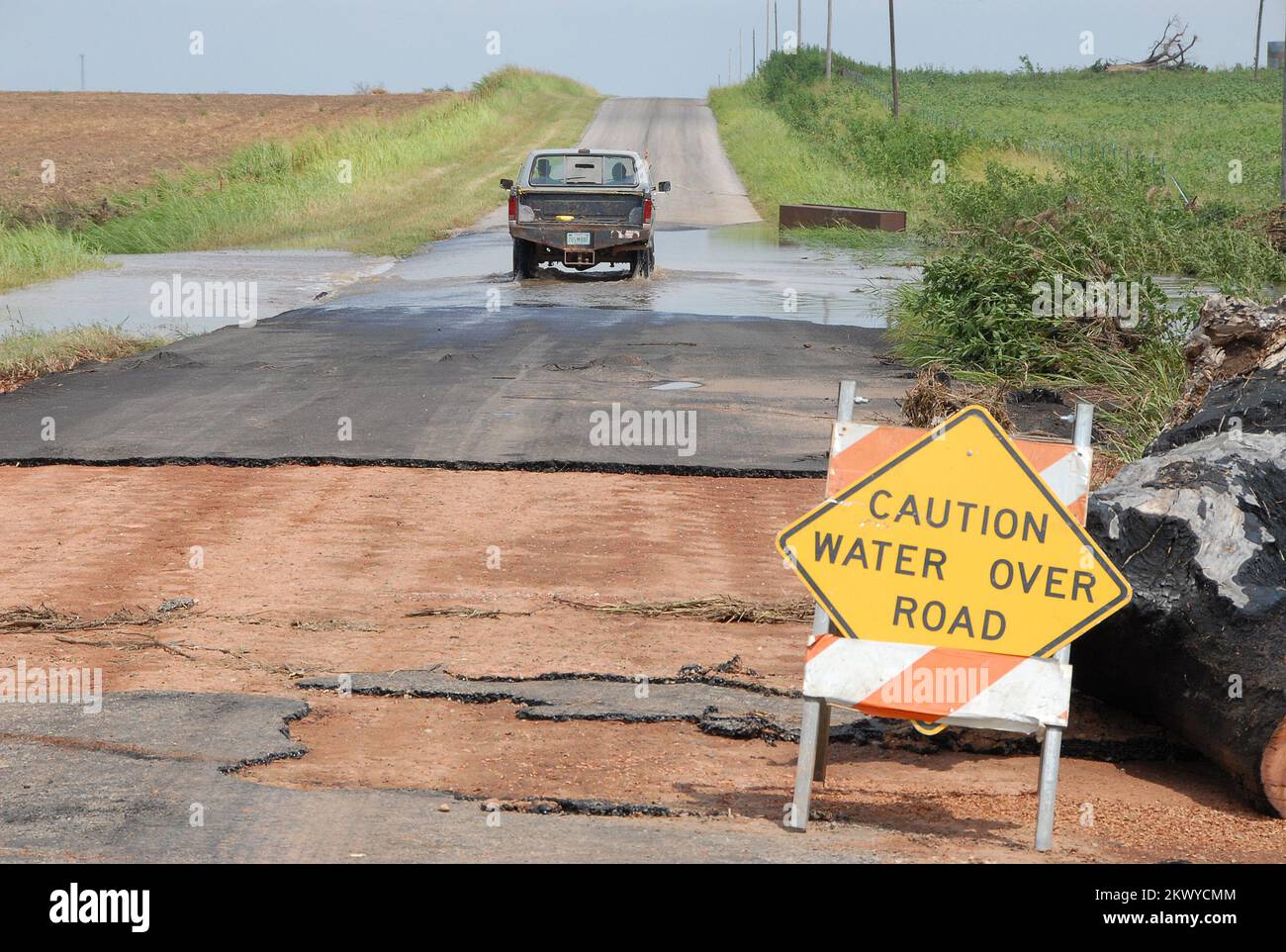 Caution Water Over Road Sign.. Photographs Relating to Disasters and ...