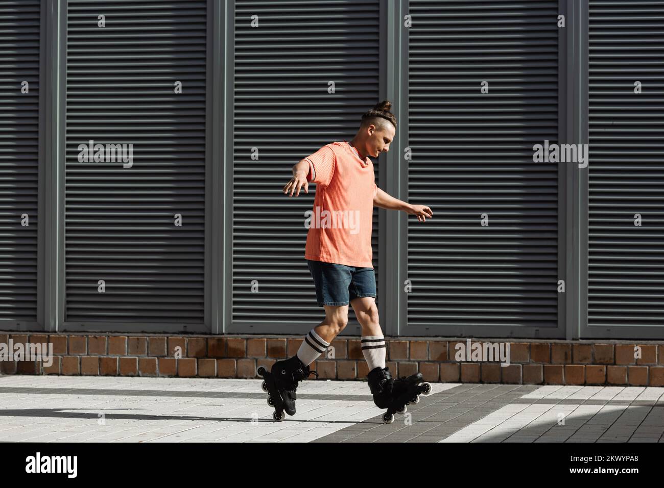 Man roller skate side view hi-res stock photography and images - Alamy