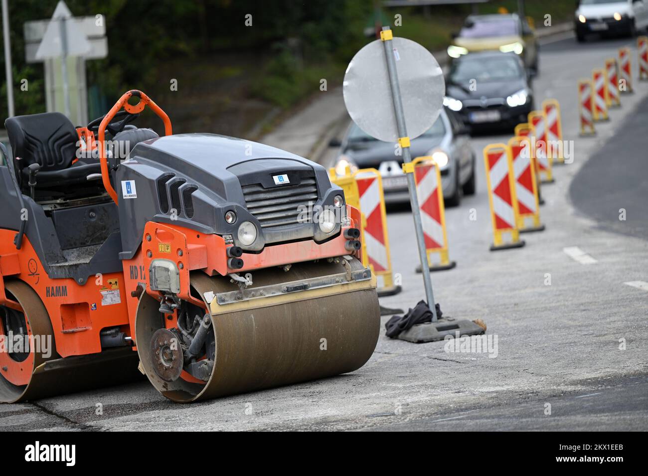 Construction worker asphalting a roadway hi-res stock photography and ...