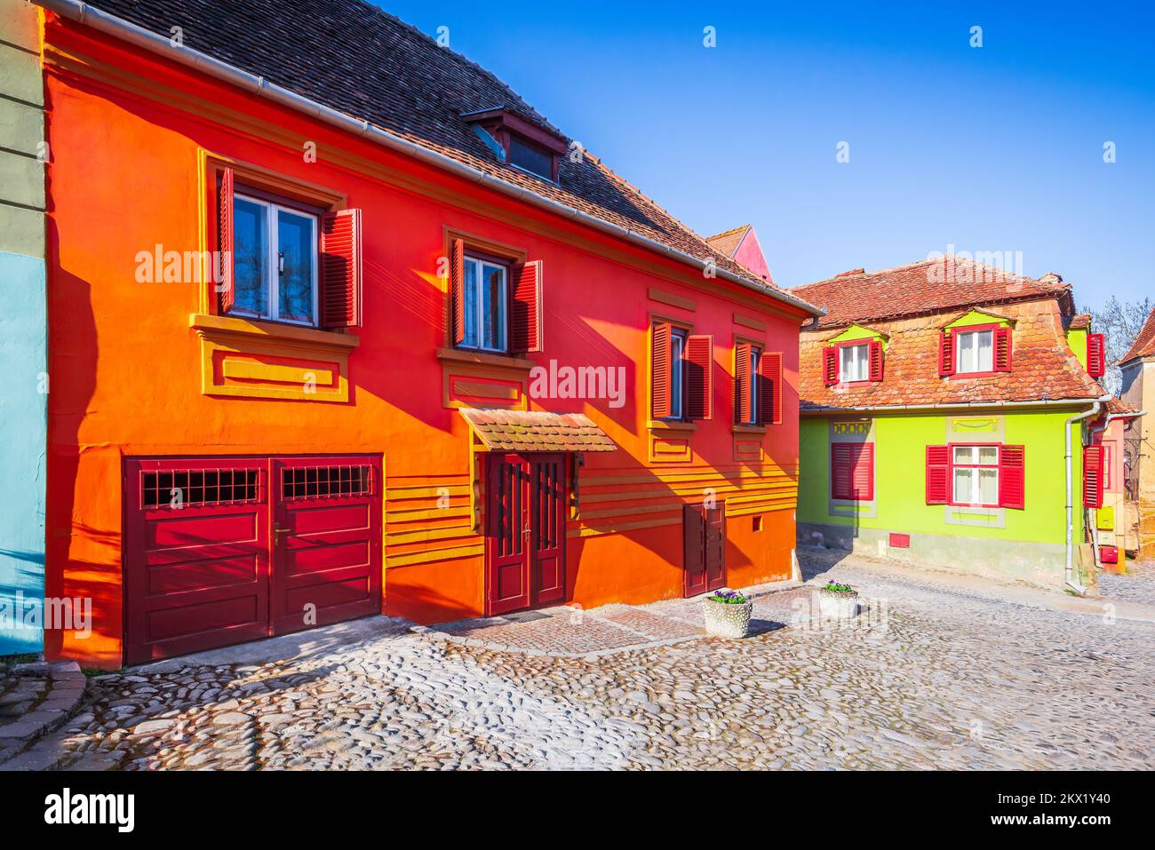 Sighisoara, Romania. Charming cobbled streets with colorful houses in ...