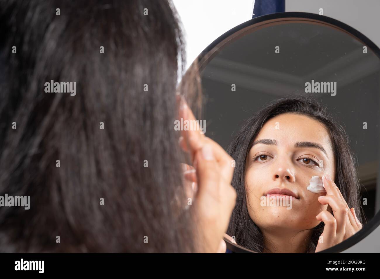 Close up girl applying cream hi-res stock photography and images - Alamy
