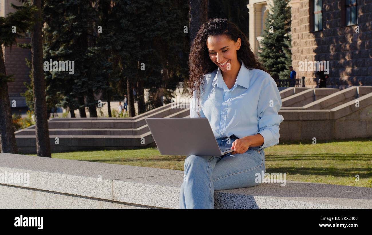 Smiling happy cheerful carefree young girl student winner successful ...