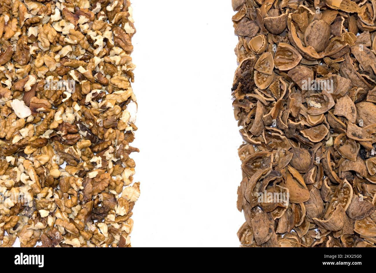 split walnuts with their shells, healthy food, dried fruit on a white ...