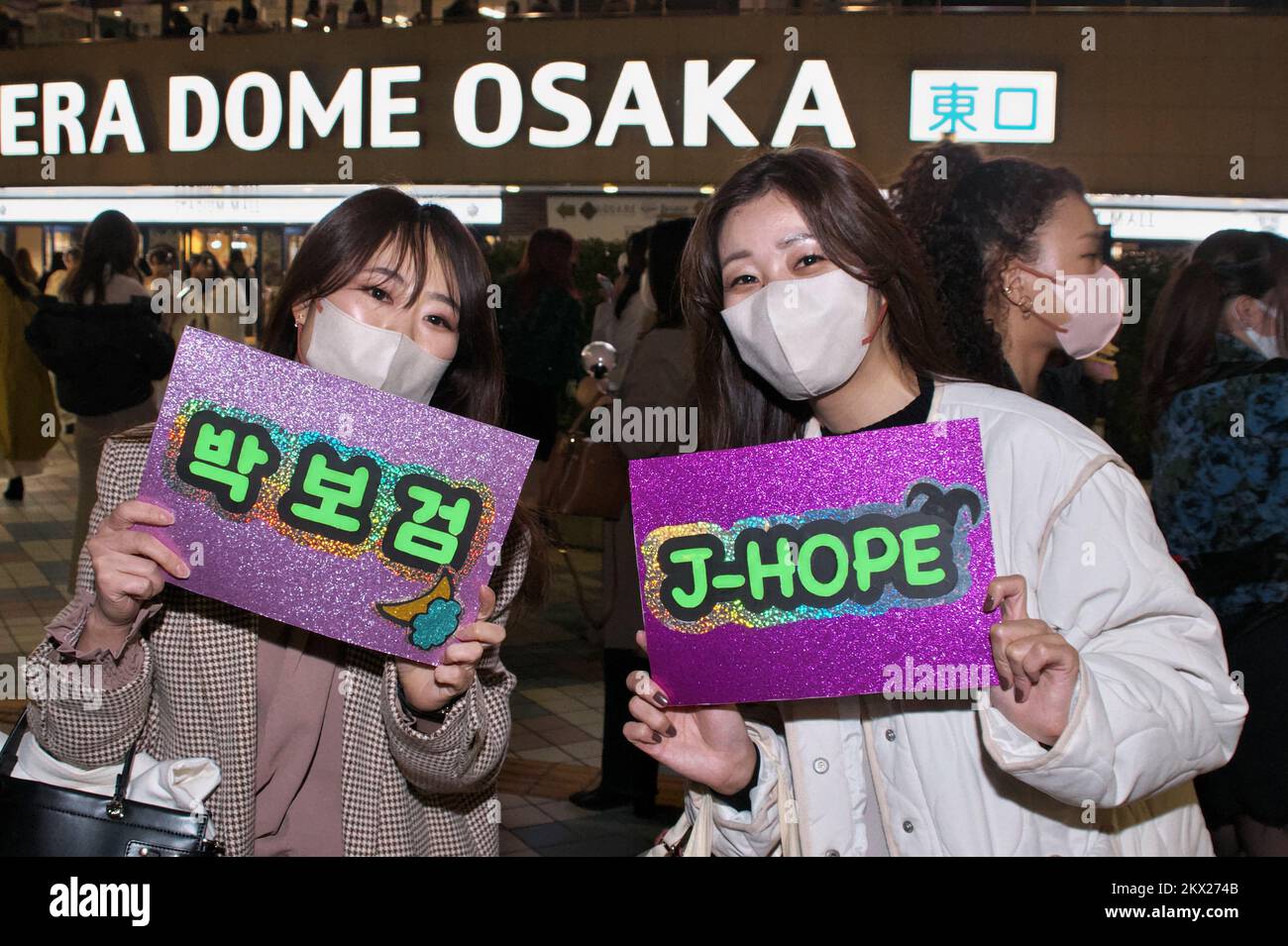 Osaka, Japan. 30th Nov, 2022. Japanese fans pose for camera outside of ...
