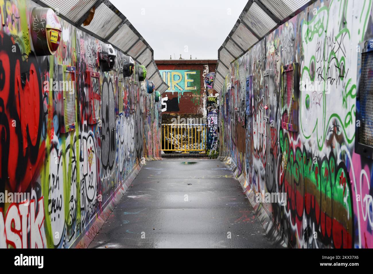 Bridge over railway line covered in spray paint hi-res stock ...