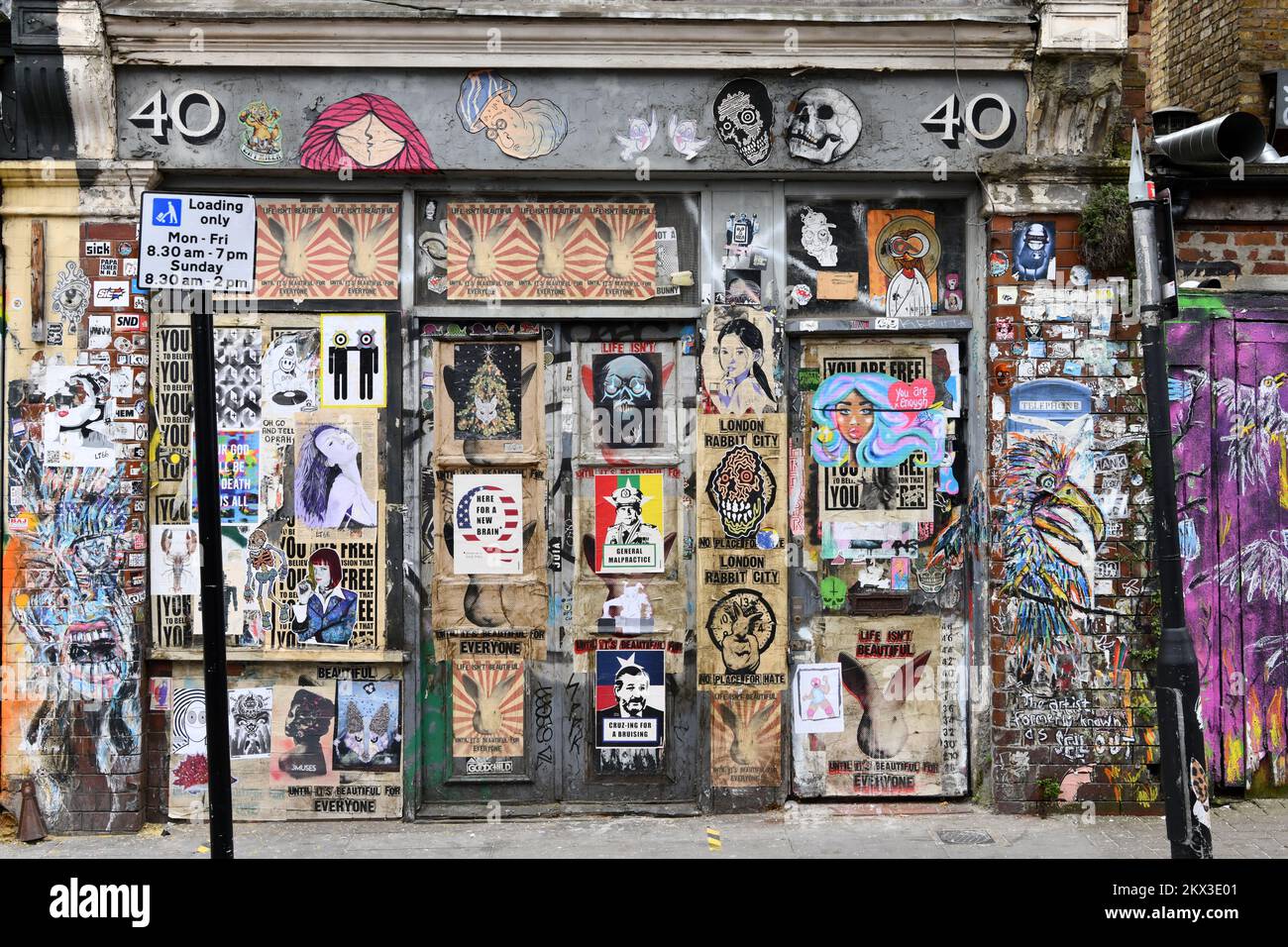 Posters paste ups stickers graffiti street art hi-res stock photography ...