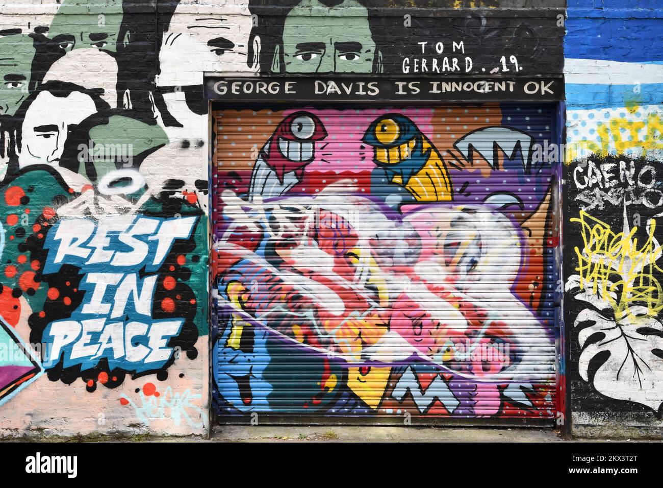 graffiti and street art on shutters in Shoreditch London Stock Photo ...