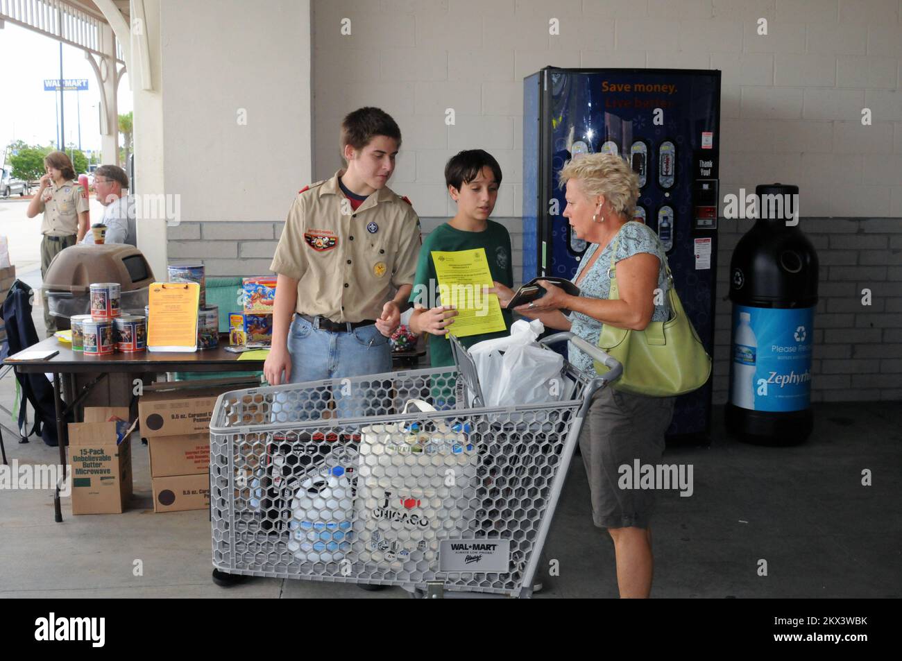 Boy Scouts hand out FEMA Disaster Information.. Photographs Relating to ...