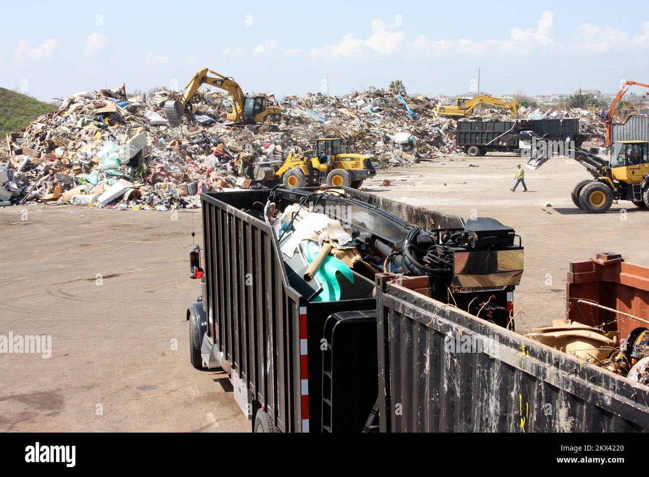 Hurricane Ike, Galveston, Texas, September 22, 2008 Trucks enter and ...