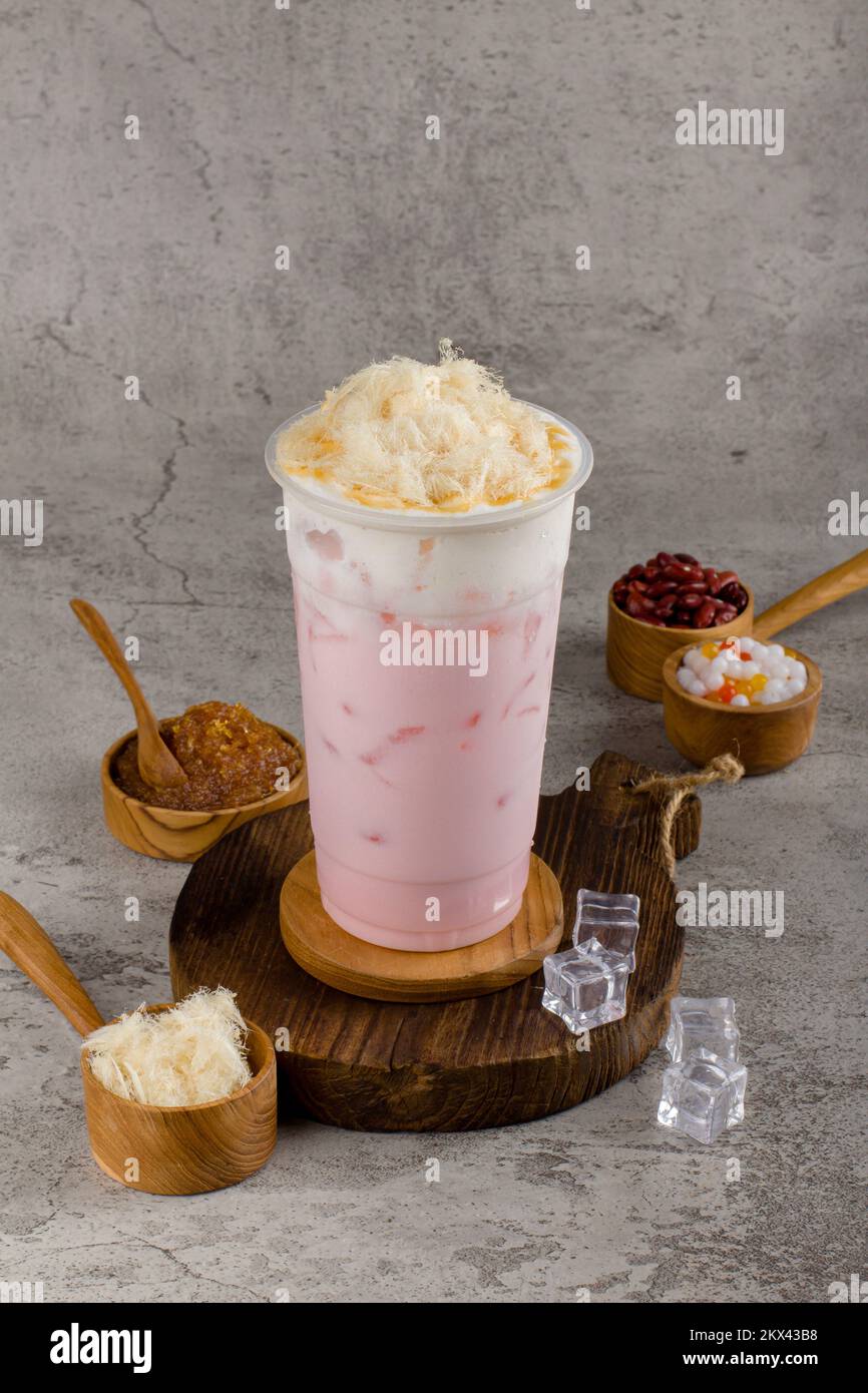 Boba or tapioca pearls is taiwan bubble milk tea in plastic cup with ...