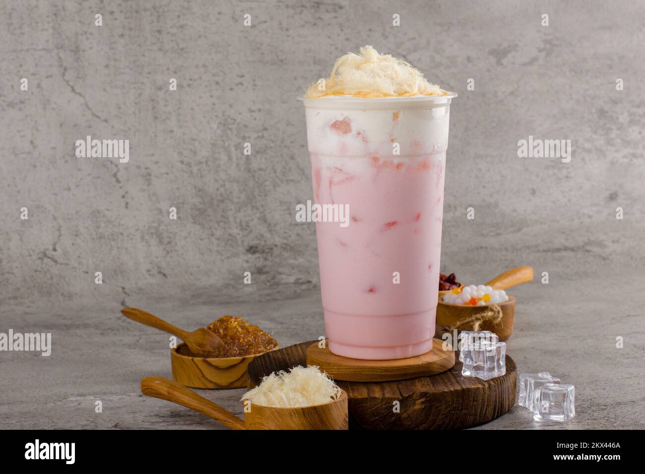 Boba or tapioca pearls is taiwan bubble milk tea in plastic cup with sugar cloud flavor on ...