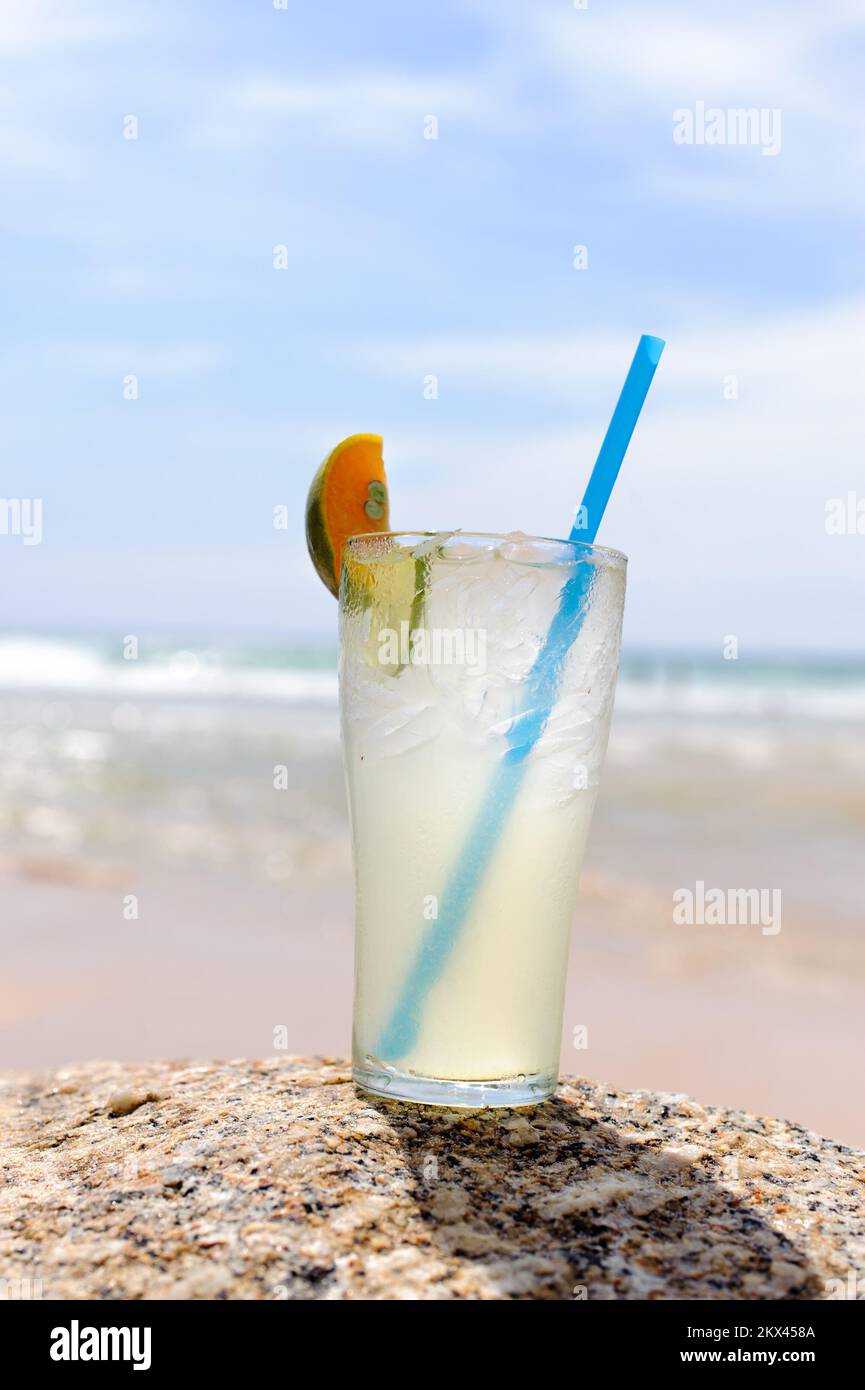 Cold fresh cocktail on the beach Stock Photo - Alamy