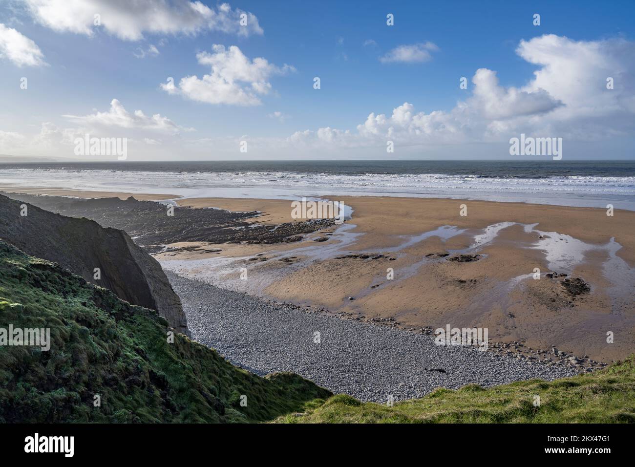 Low sunshine over Sandymouth beach in Cornwall West Country Stock Photo ...