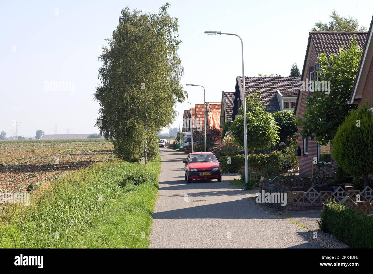 Netherlands, agricultural field at the edge of a Dutch village Stock ...