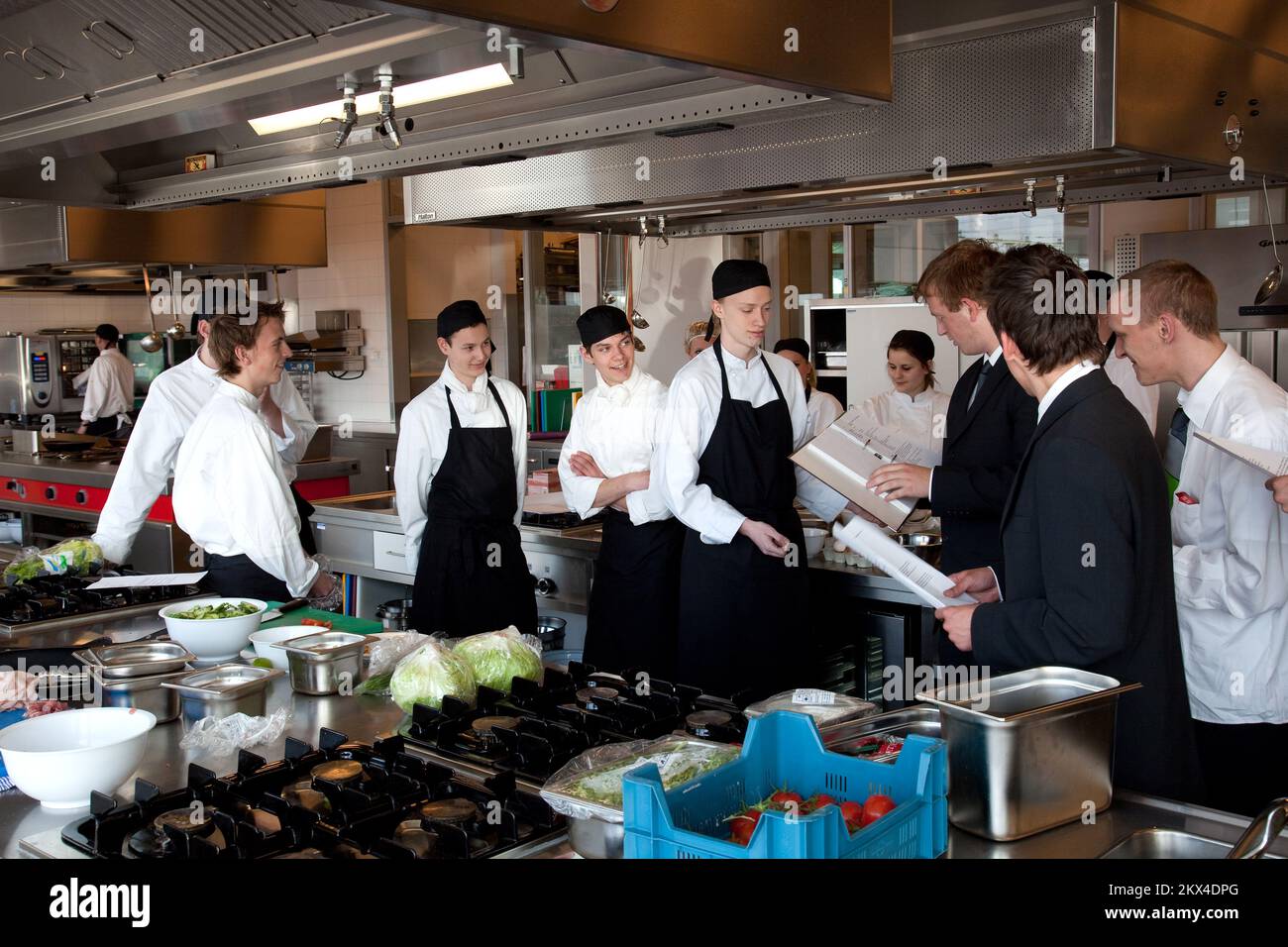 Netherlands, Nijmegen, students receive instruction from their teachers ...