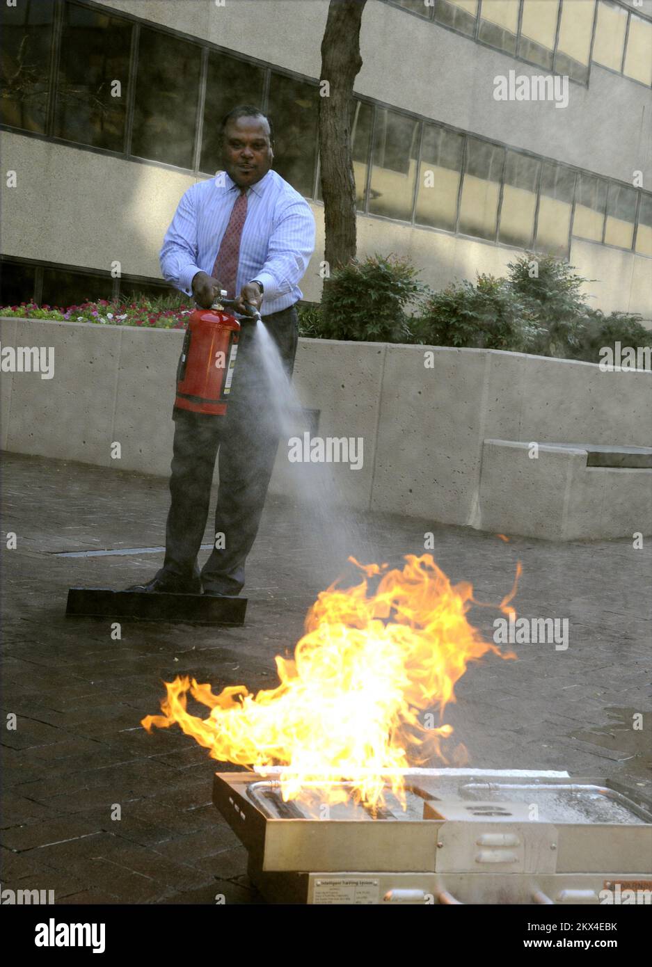 Fire - Washington, D. C. , Oct. 7, 2008 Calvin Gurley extinguishes a ...