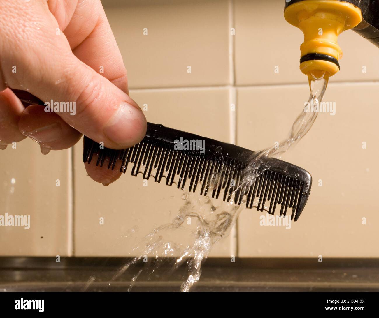 After the comb has passed through hair, it is negatively charged. Water ...