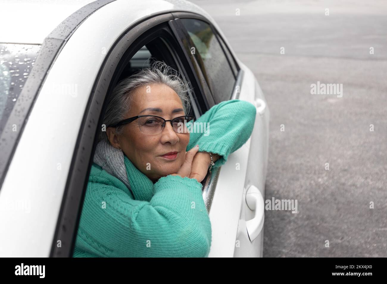 Old lady sits car hi-res stock photography and images - Alamy