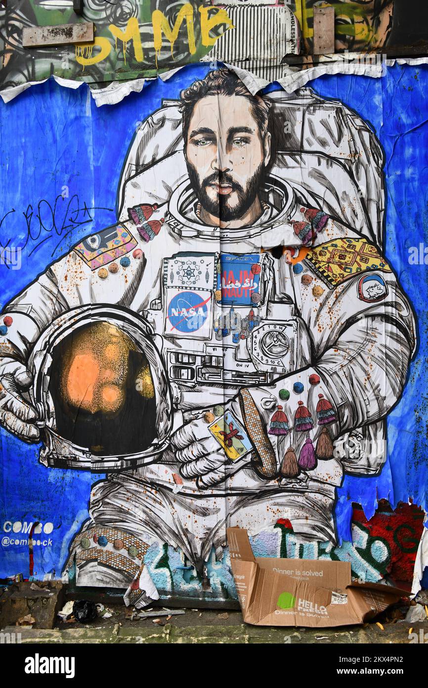 paste up street art astronaut on a wall in Shoreditch London Stock ...