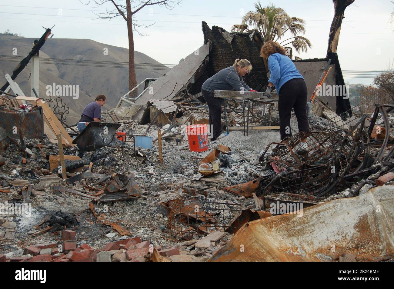 Fire Wildfire - Yorba Linda, Calif. , December 12, 2008 Home owners sift through debris after ...