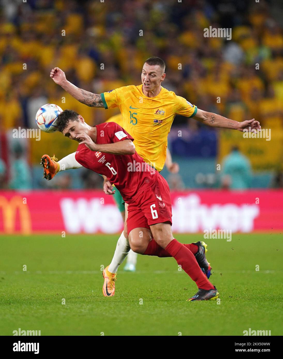Denmark's Andreas Christensen and Australia's Mitchell Duke battle for ...