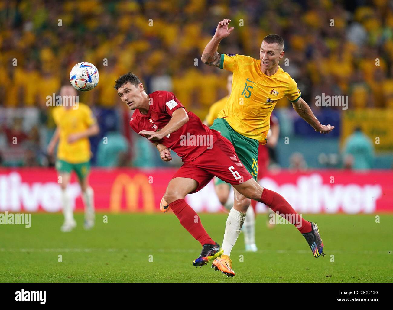 Denmark's Andreas Christensen and Australia's Mitchell Duke battle for ...