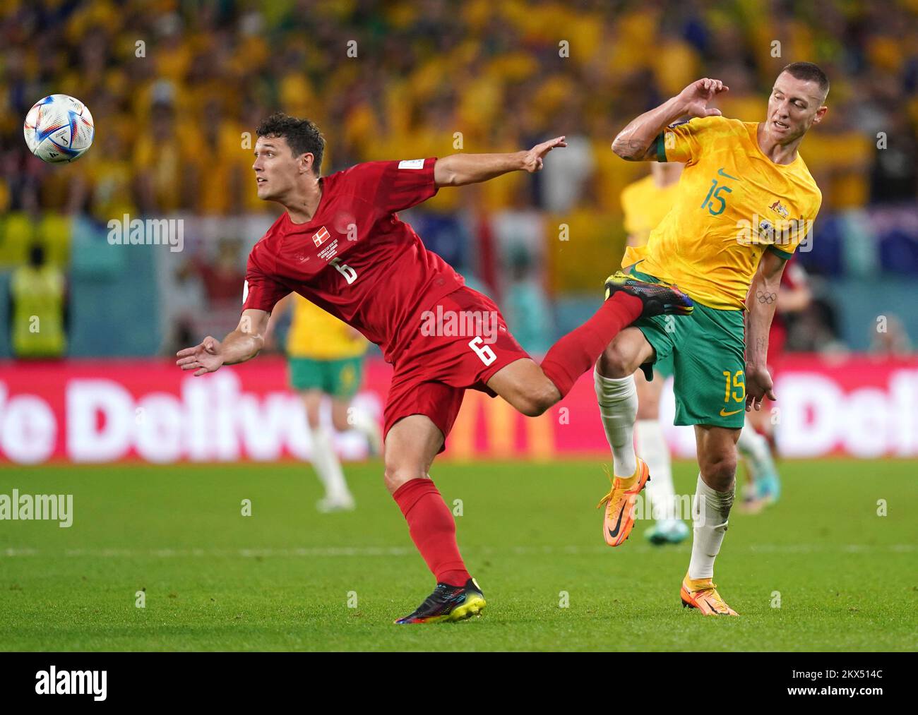 Denmark's Andreas Christensen and Australia's Mitchell Duke battle for ...