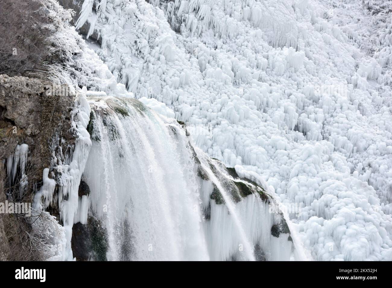 27.02.2018., Knin, Croatia - The frozen 22-meter high waterfall Krcic ...
