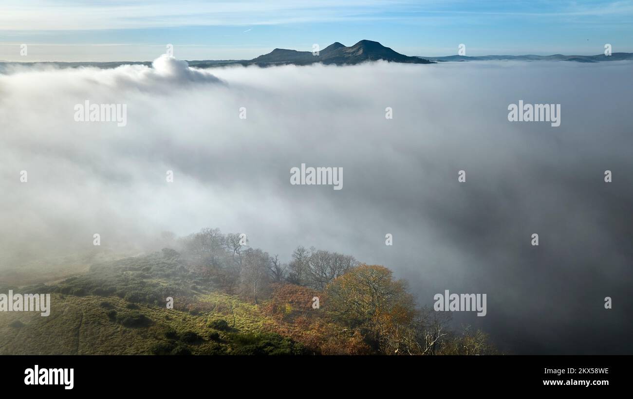 Aerial view of a cloud inversion around the Eildons and the River Tweed ...