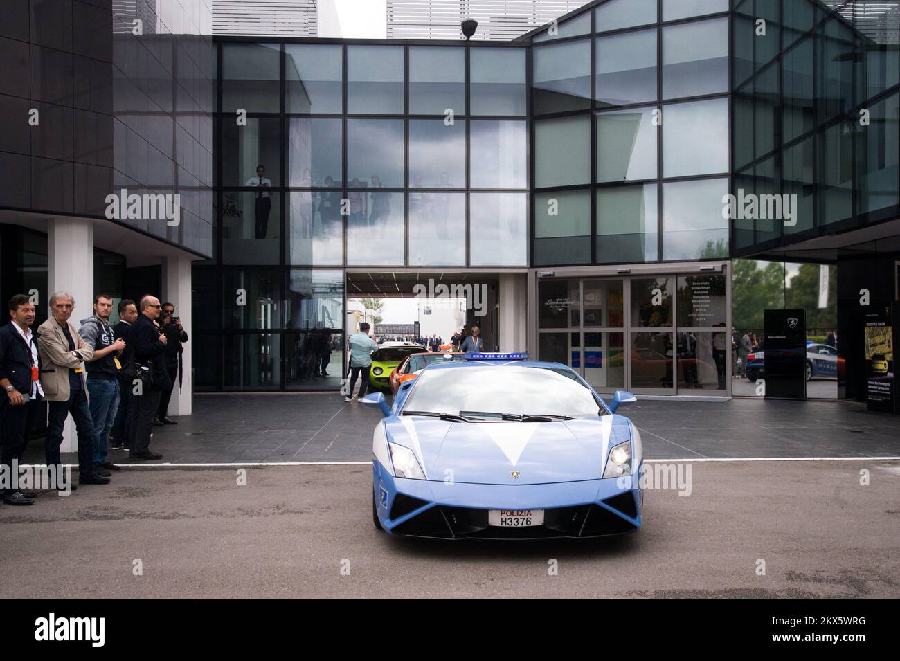 The departure of a fleet of Lamborghini Miura's during the opening of a ...