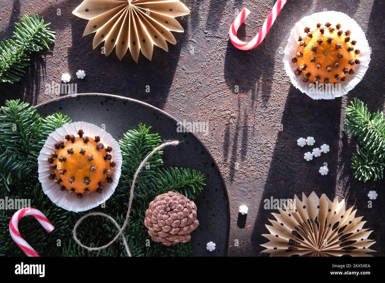 Wintertime dark background with fragrant pomander balls. Classical ...