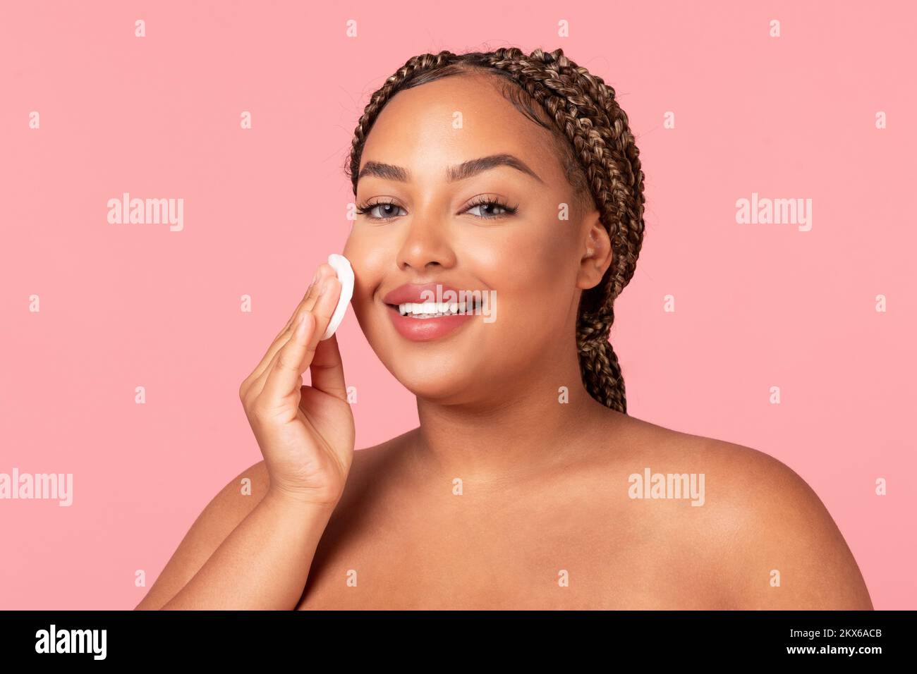 Facial Skincare Concept Happy Black Chubby Woman Using Cotton Pad 0669