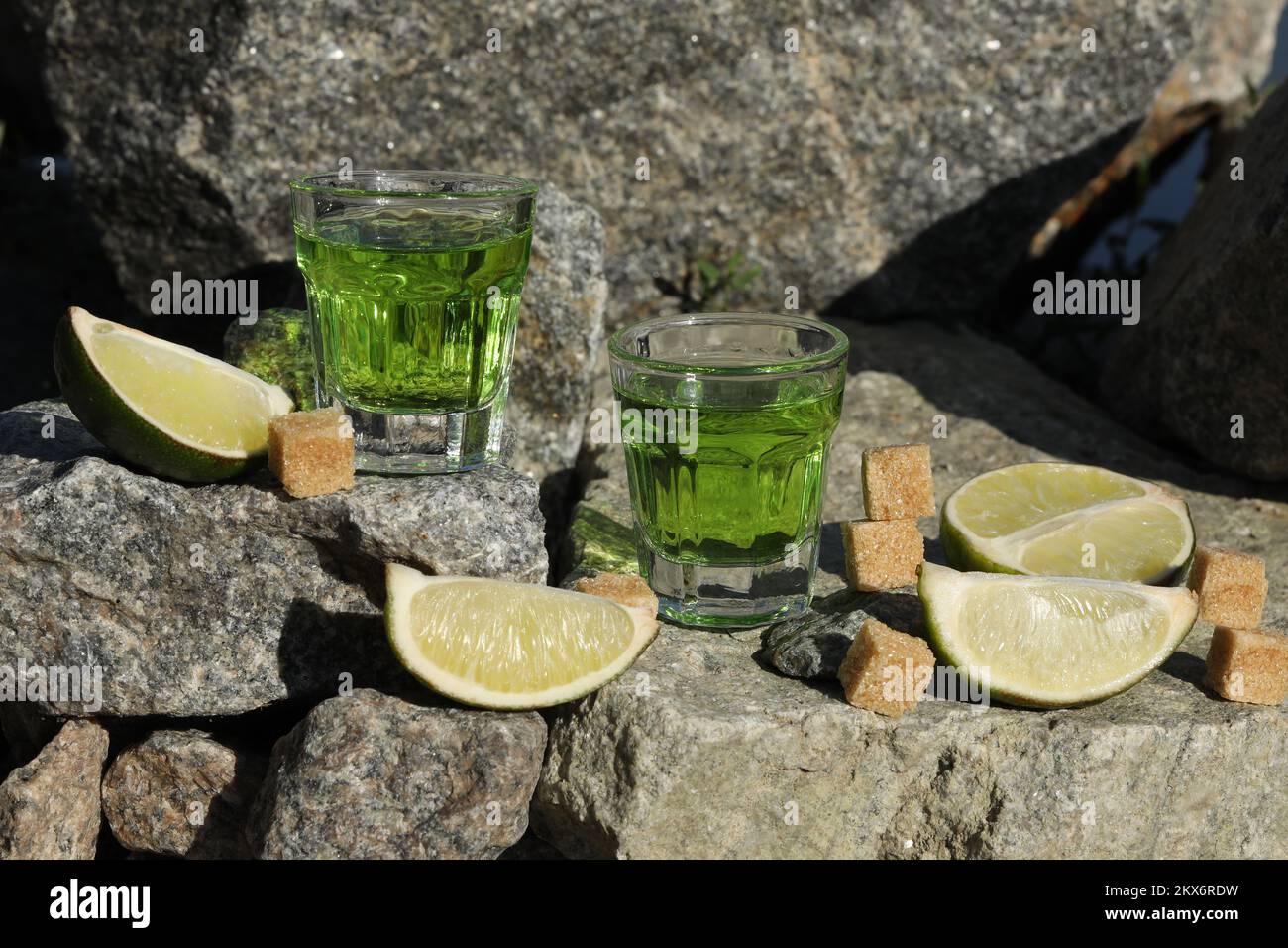 green absinthe drink pattern on the stones background with copy space ...