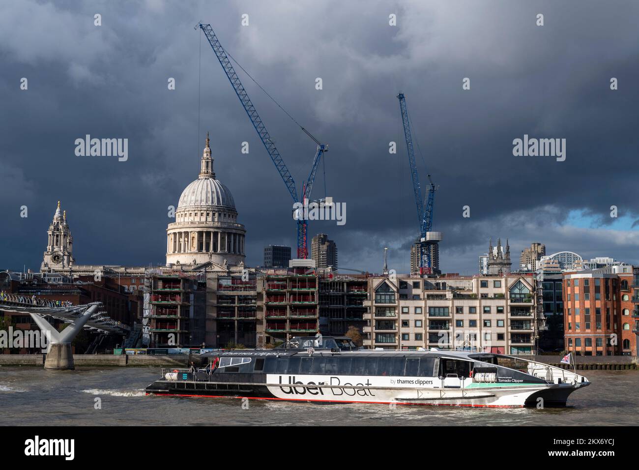 An Uber Boat by Thames Clippers, river bus coming under the Millennium ...