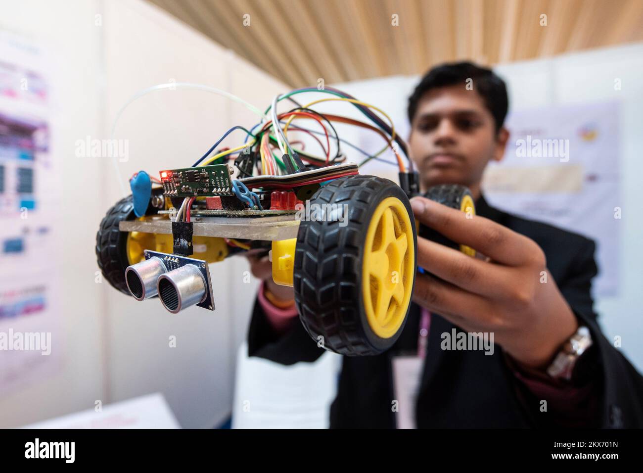 GUWAHATI, INDIA - NOVEMBER 26: Participant showing his science model ...