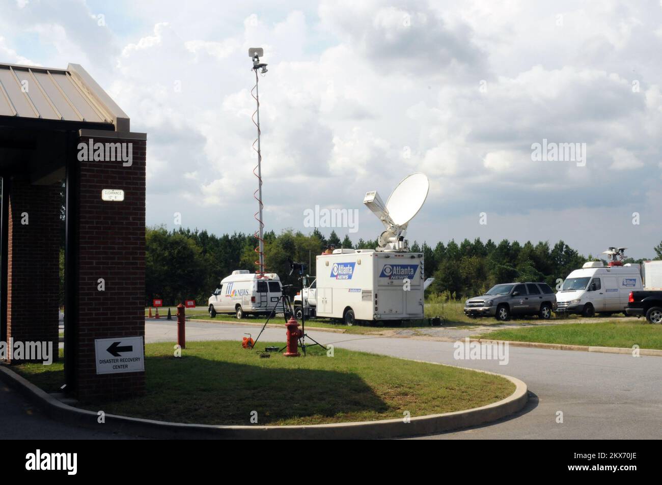 Media vehicles at Cobb County DRC. Georgia Severe Storms and Flooding ...
