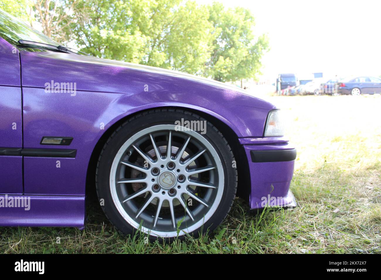 car on a car show with a beutiful paint job and rims Stock Photo - Alamy