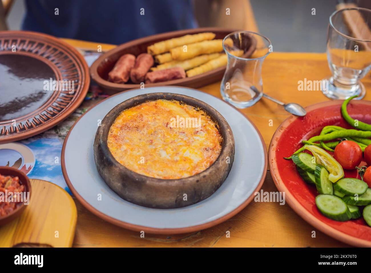 Menemen, Turkish breakfast, eggs with peppers and tomatoes, top view ...