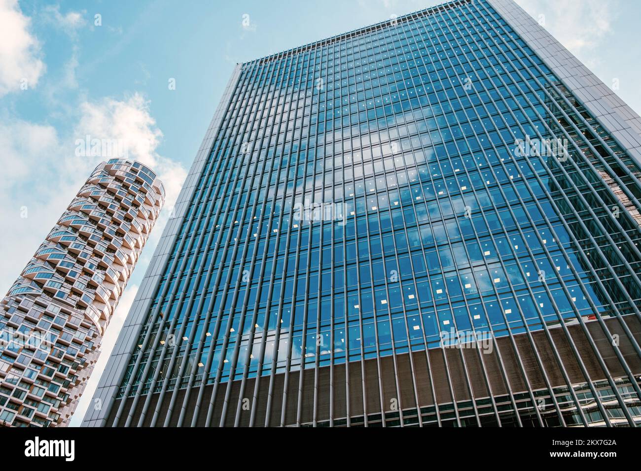 Detail of skyscraper 10 Upper Bank street and cylindrical residential ...