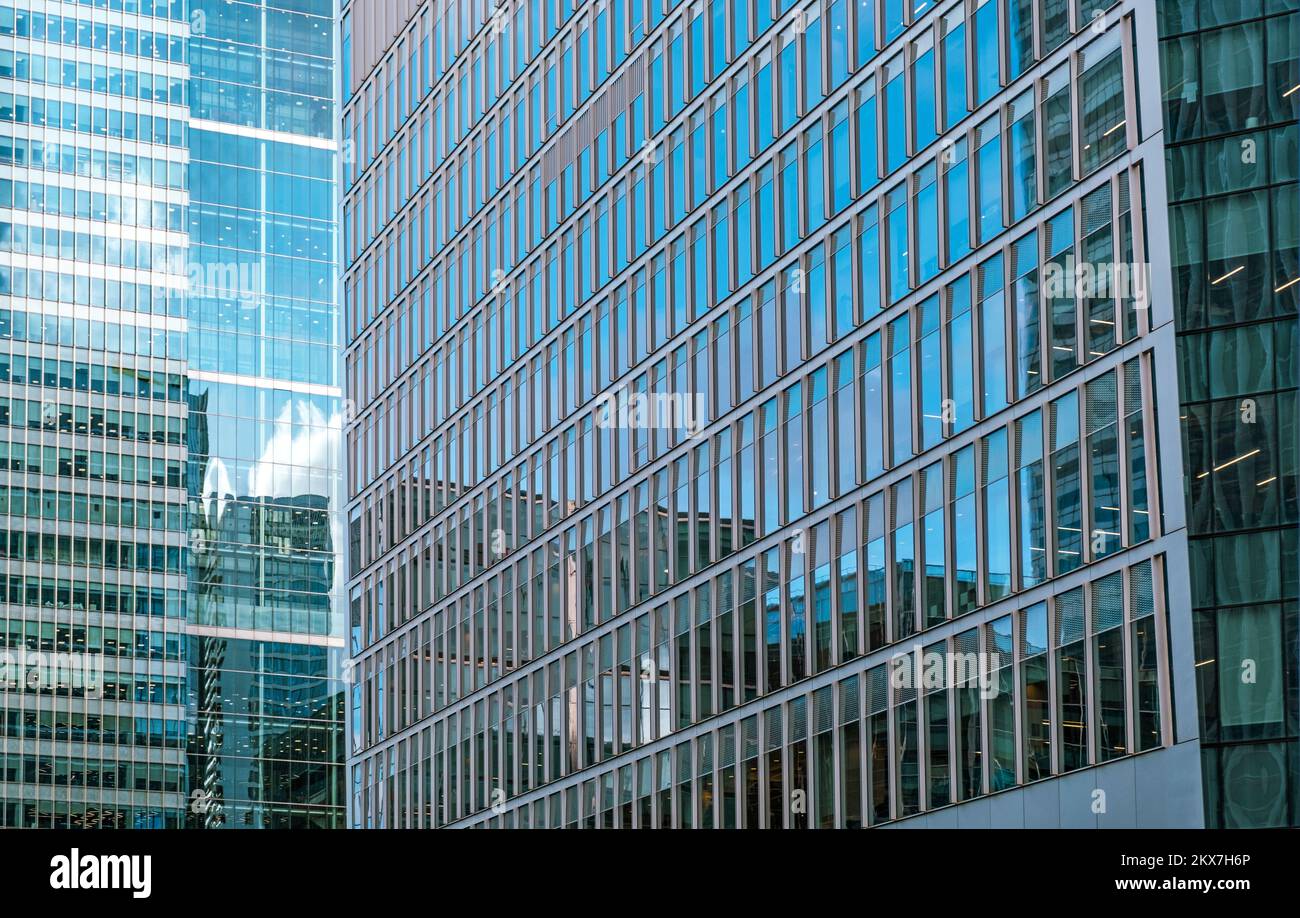 Detail of exteriors of high-rise buildings in Canary Wharf, covered ...