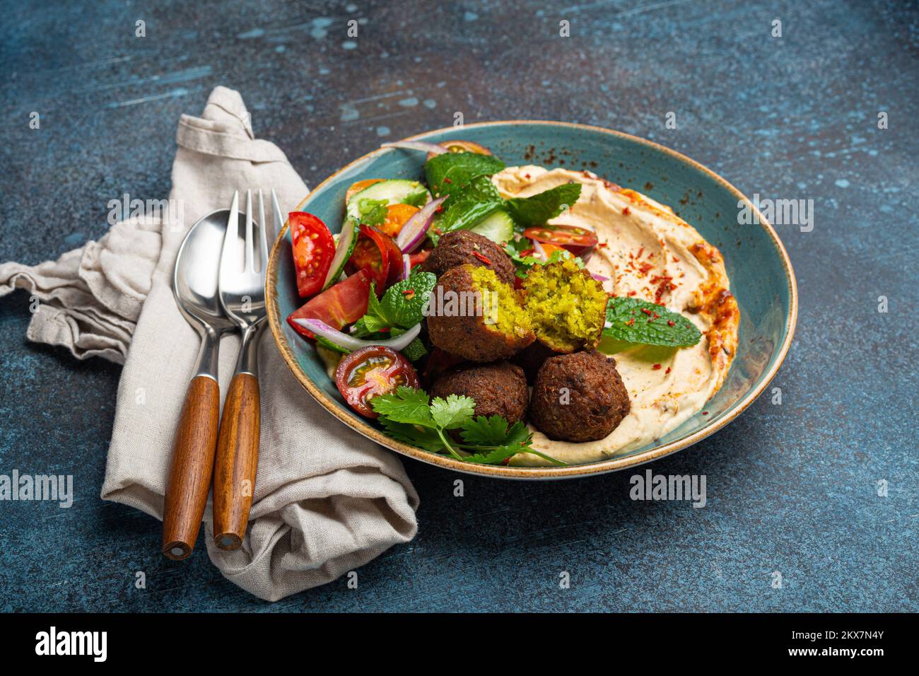Close up of Middle Eastern Arab meal with fried falafel, hummus ...