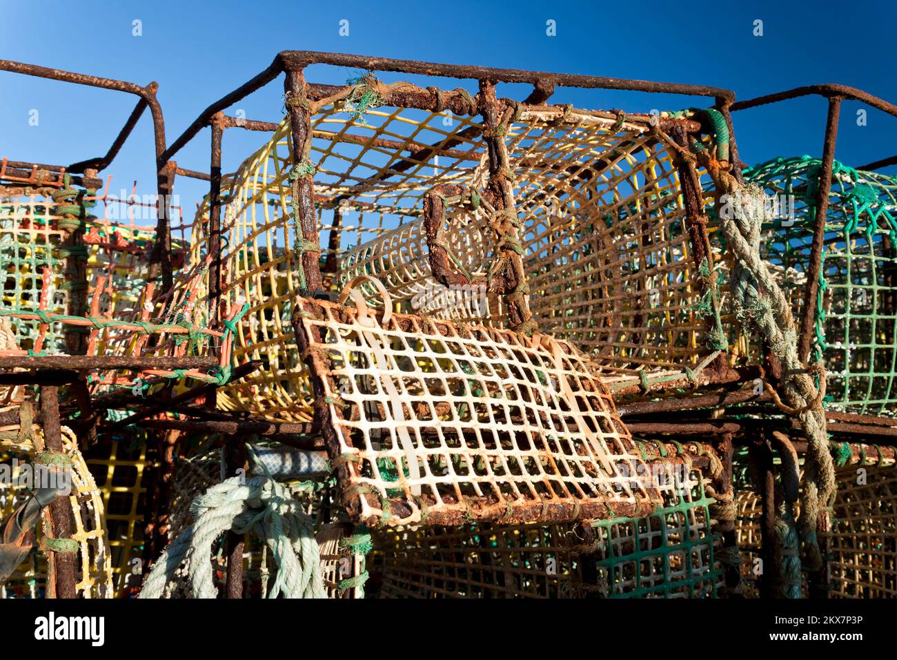 Pile of old crab fishing pots on the waterfront of fishing port Stock ...