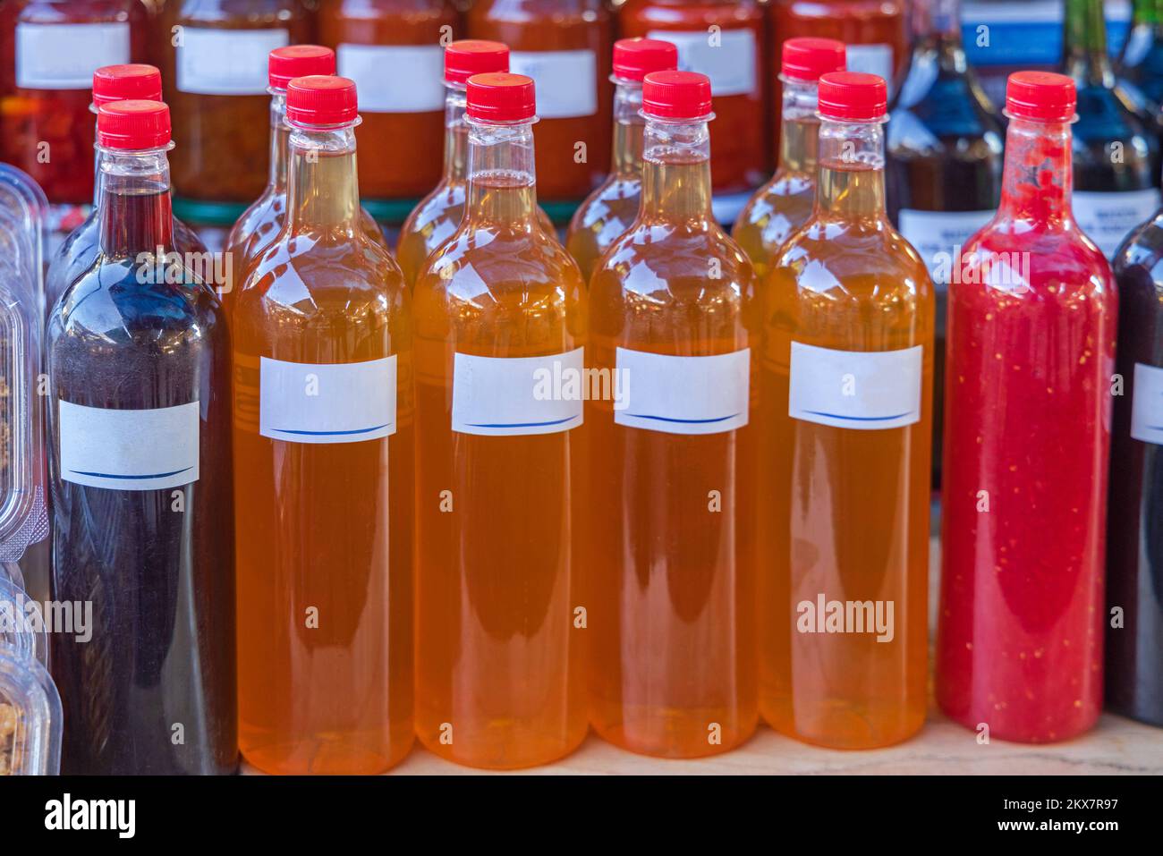 Homemade Apple Cider Vinegar in Glass Beverage Bottles Stock Photo - Alamy
