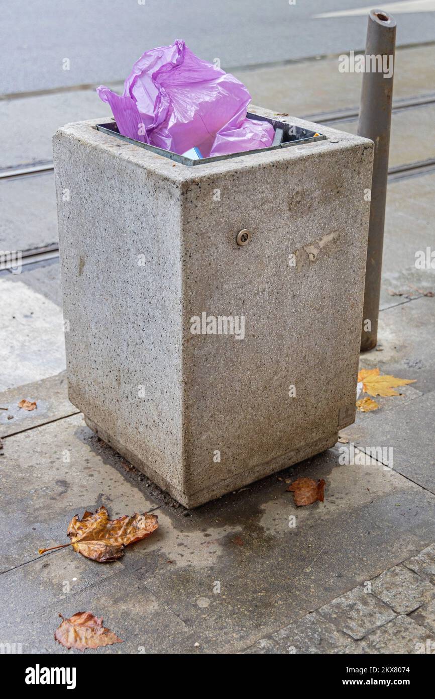 Modern Square Shape Street Trash Can Overflow With Garbage Stock Photo - Alamy